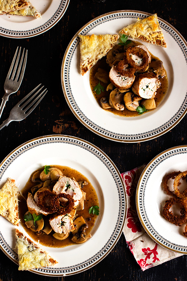 Parsley Butter Chicken Roulade with Spicy Mushrooms, Crispy Onion Rings ...